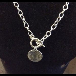 Jewelry | Silver Never Never Give Up Coin Toggle Necklace | Poshmark